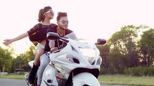 Bikers, pillion riders wearing helmets unstrapped, without ISI mark to ...